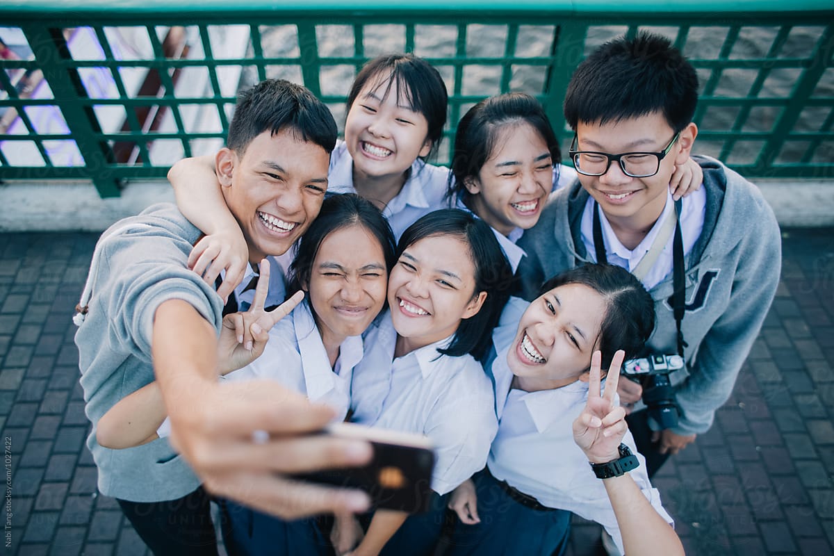  Group Of Young Asian Students Making Self Portrait With The Phone By