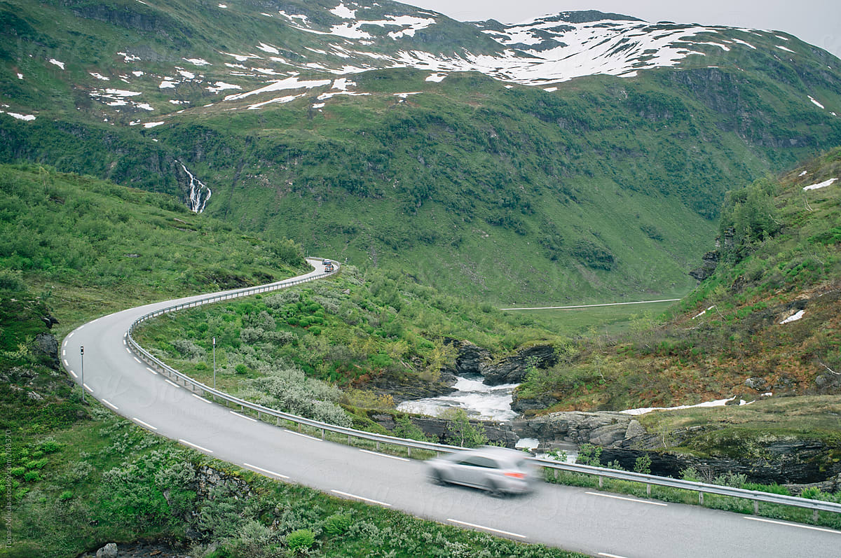 "Mountain Road" by Stocksy Contributor "Tomas Mikula" - Stocksy