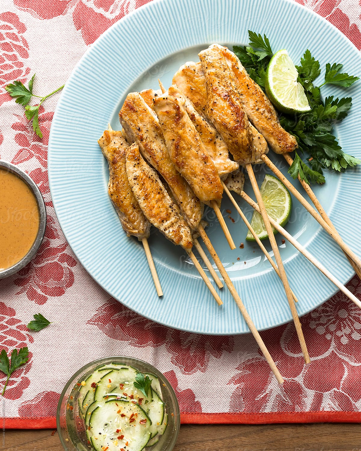 "Thai Chicken Sate Skewers With Lime, Parsley And Cucumber" by Stocksy ...