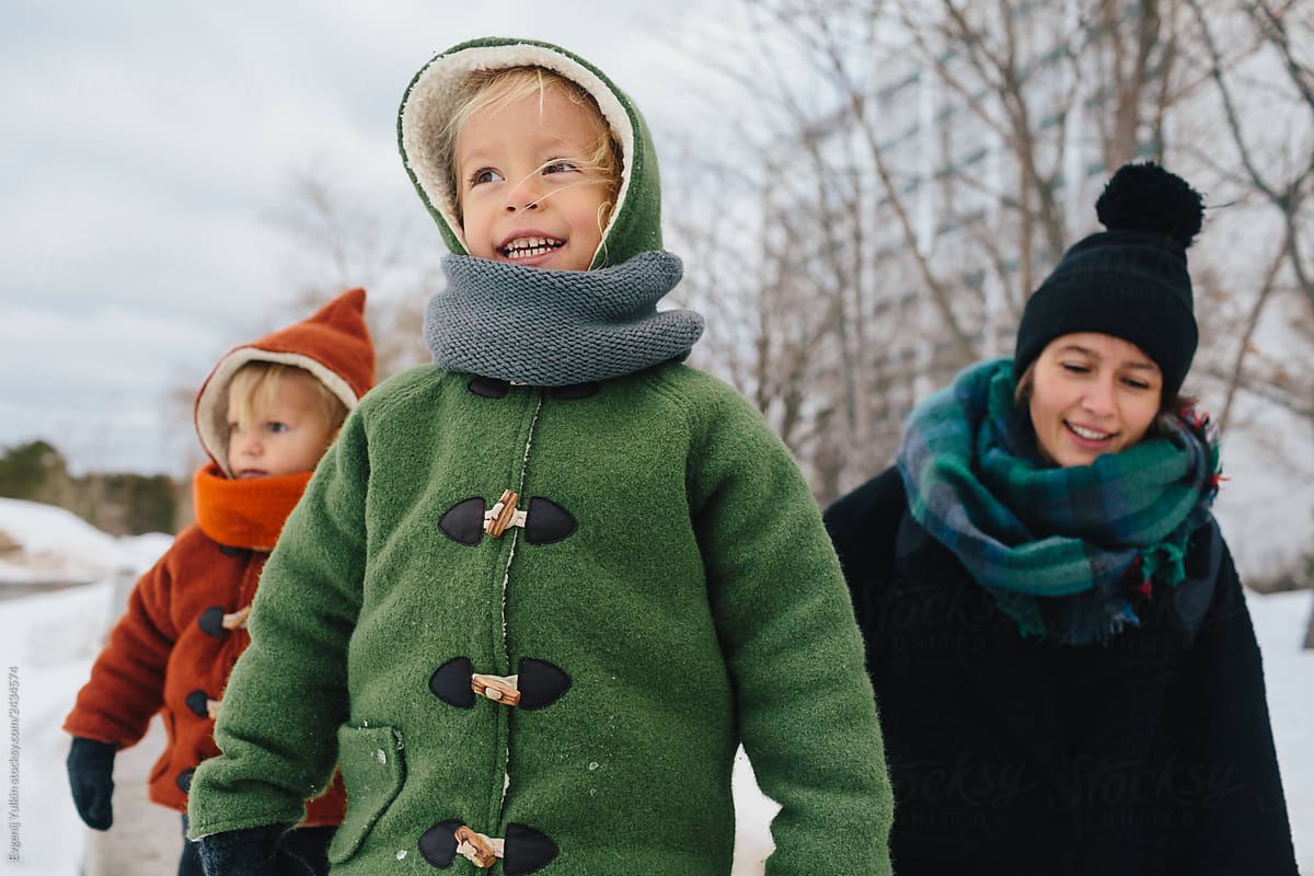 "Mother And Children On Winter Walk" by Stocksy Contributor "Evgenij ...