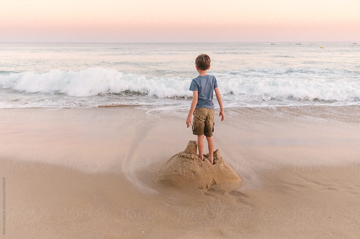 "Boys Standing On Sandcastle Waiting For The Sea To Destroy It" by ...