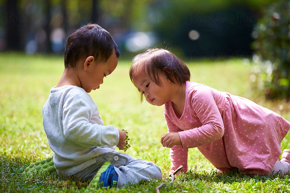 "Two Lovely Kids Together On The Lawn" by Stocksy Contributor "Bo Bo ...