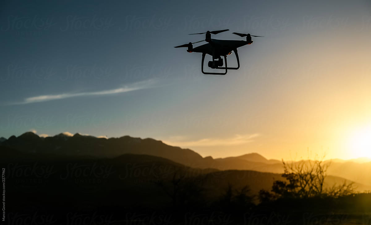 "Drone Starting The Flight At Sunset" by Stocksy Contributor "Marco ...