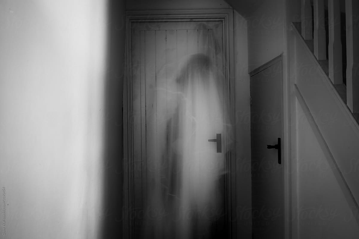 "A Ghostly, Blurred, Hooded Figure. Standing In A Corridor." by Stocksy ...