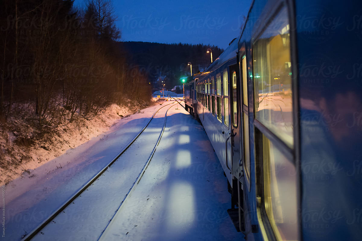 "Traveling By Train In Winter Night" by Stocksy Contributor "Tomas ...