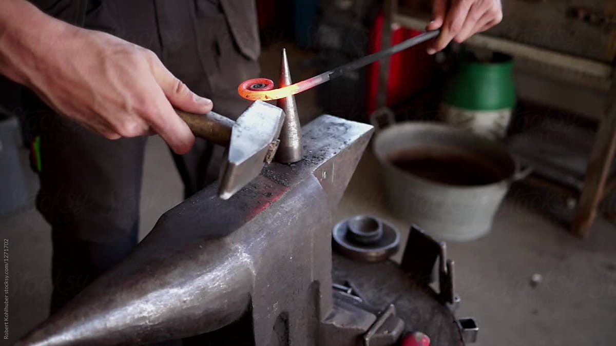 "Blacksmith Working In Workshop" by Stocksy Contributor "Robert ...