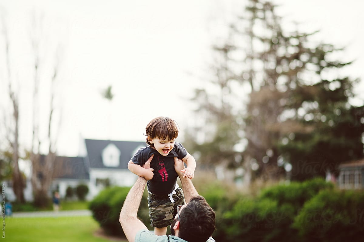 "Father Throwing Son In The Air Outside" by Stocksy Contributor "Kate ...