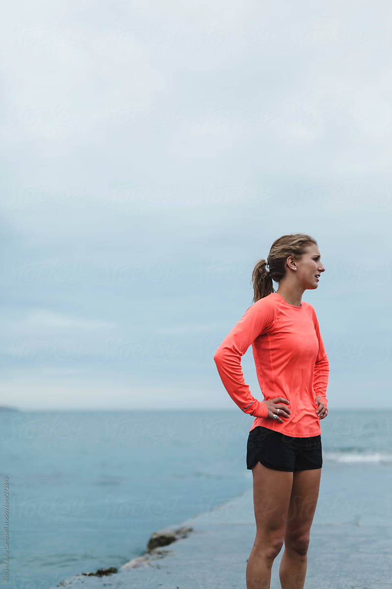 "Motivated Young Runner Woman Breathing Hard Outside On Cold Windy Day ...