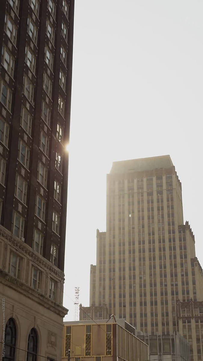 "Sunlight In City High Rise Buildings" by Stocksy Contributor "Maryanne ...