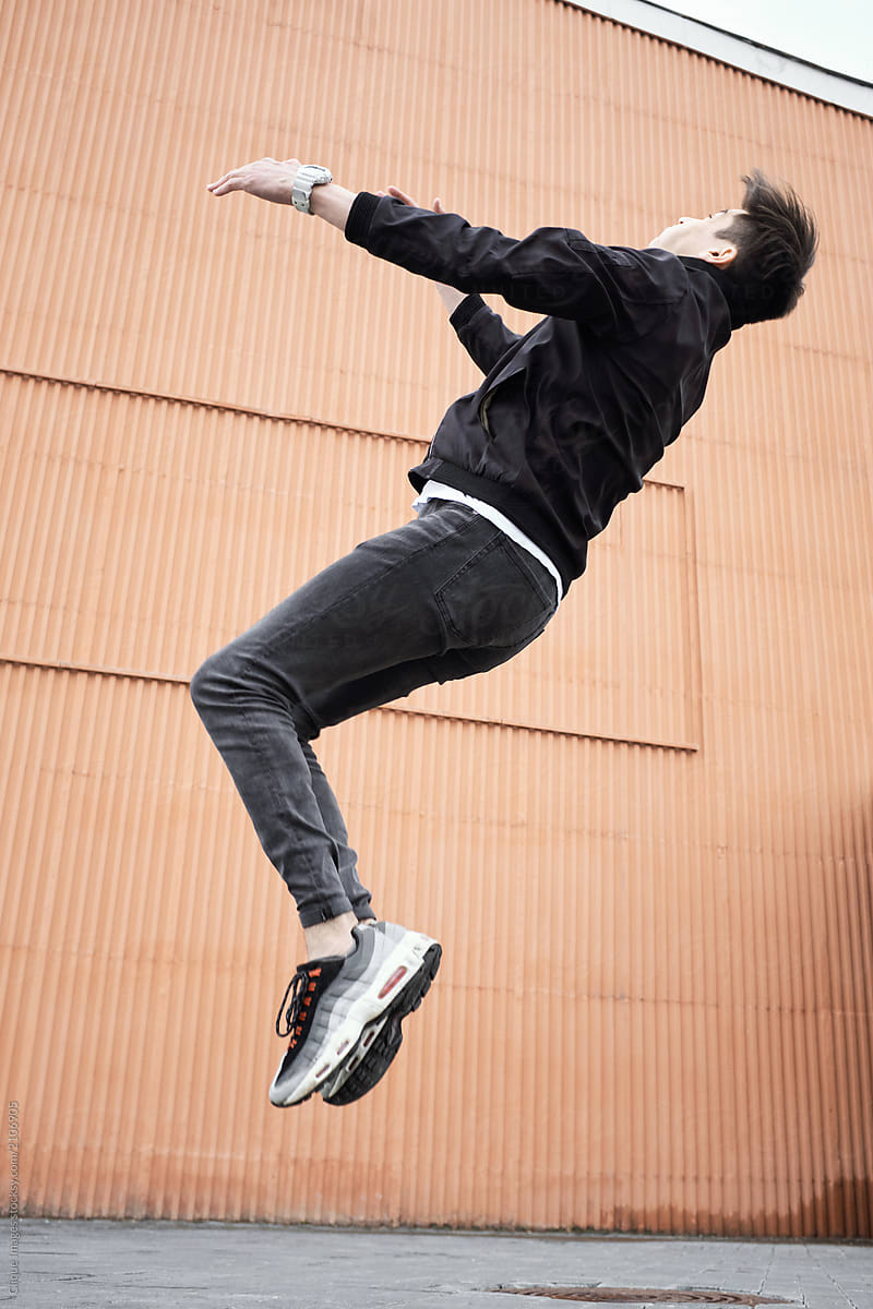 "Street Dancer Doing Flip" by Stocksy Contributor "Clique Images" - Stocksy