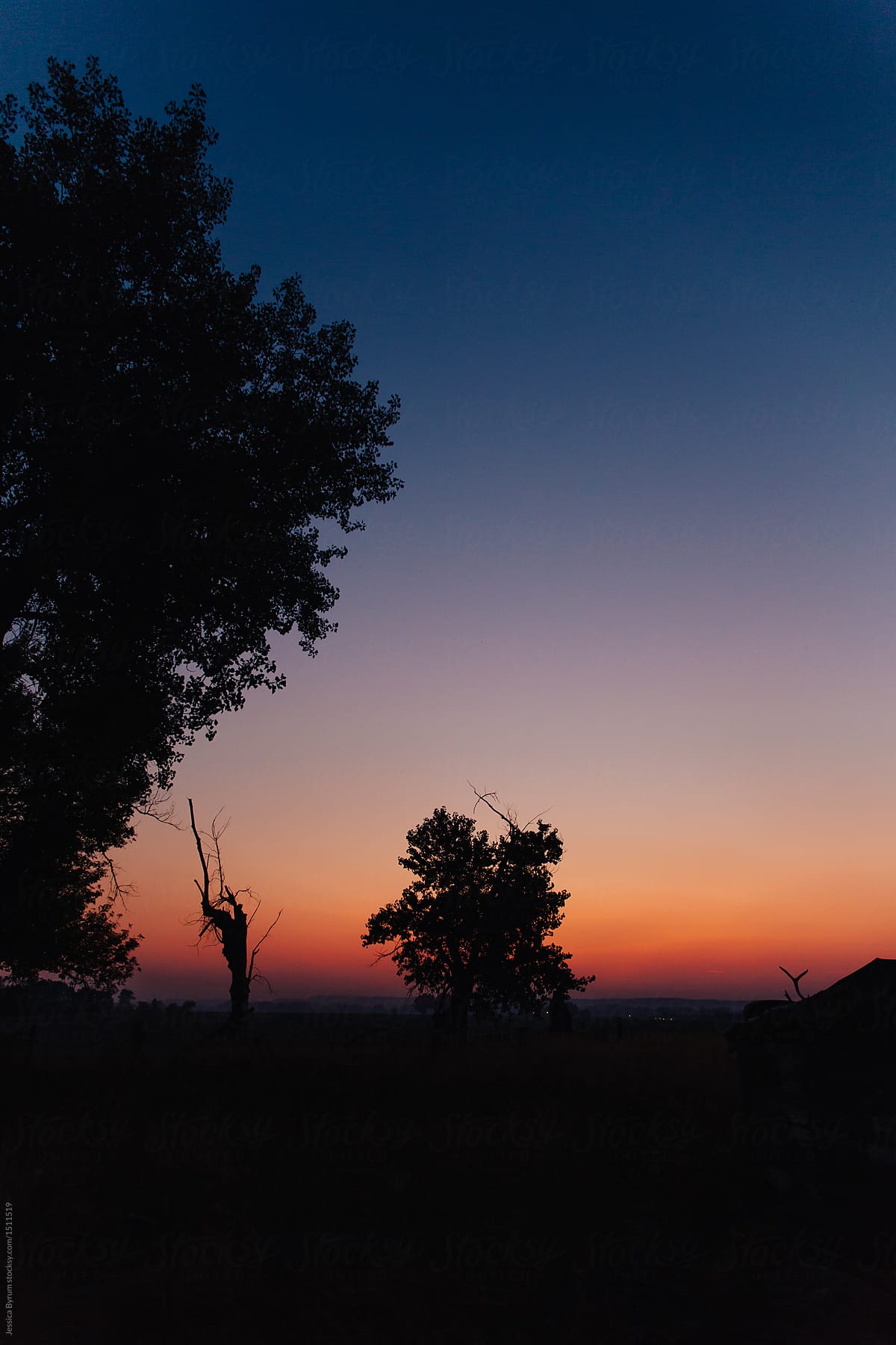 "Smokey Sunset On A Farm In Montana." by Stocksy Contributor "Jessica ...