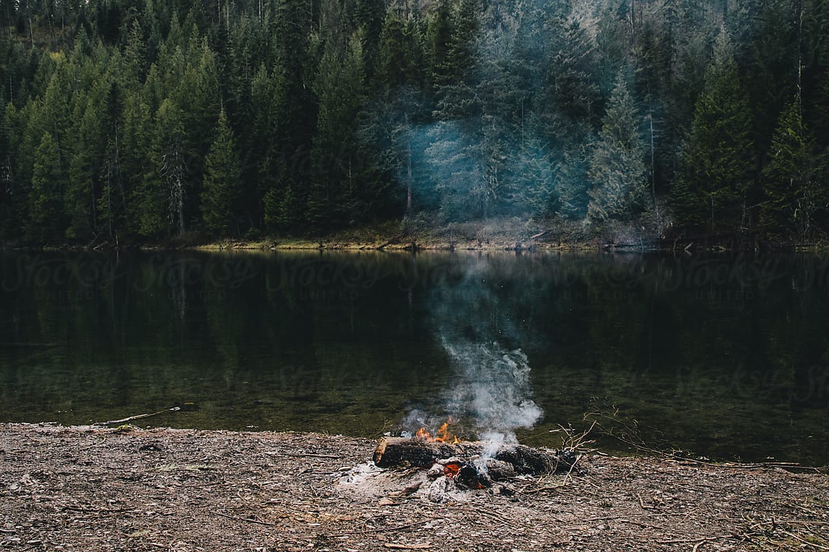 "Deserted Campfire Near On A Lake Shore" by Stocksy Contributor "Justin ...