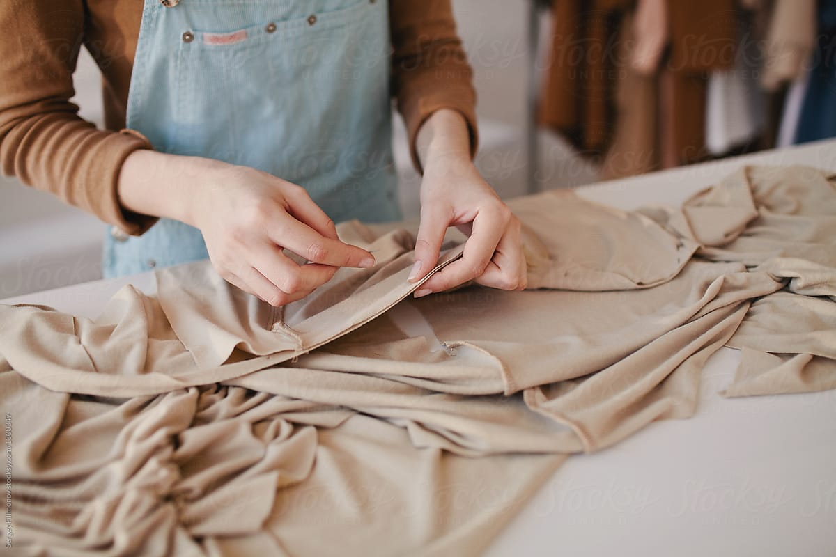 "Fashion Designer Work In Her Studio" by Stocksy Contributor "Serge ...