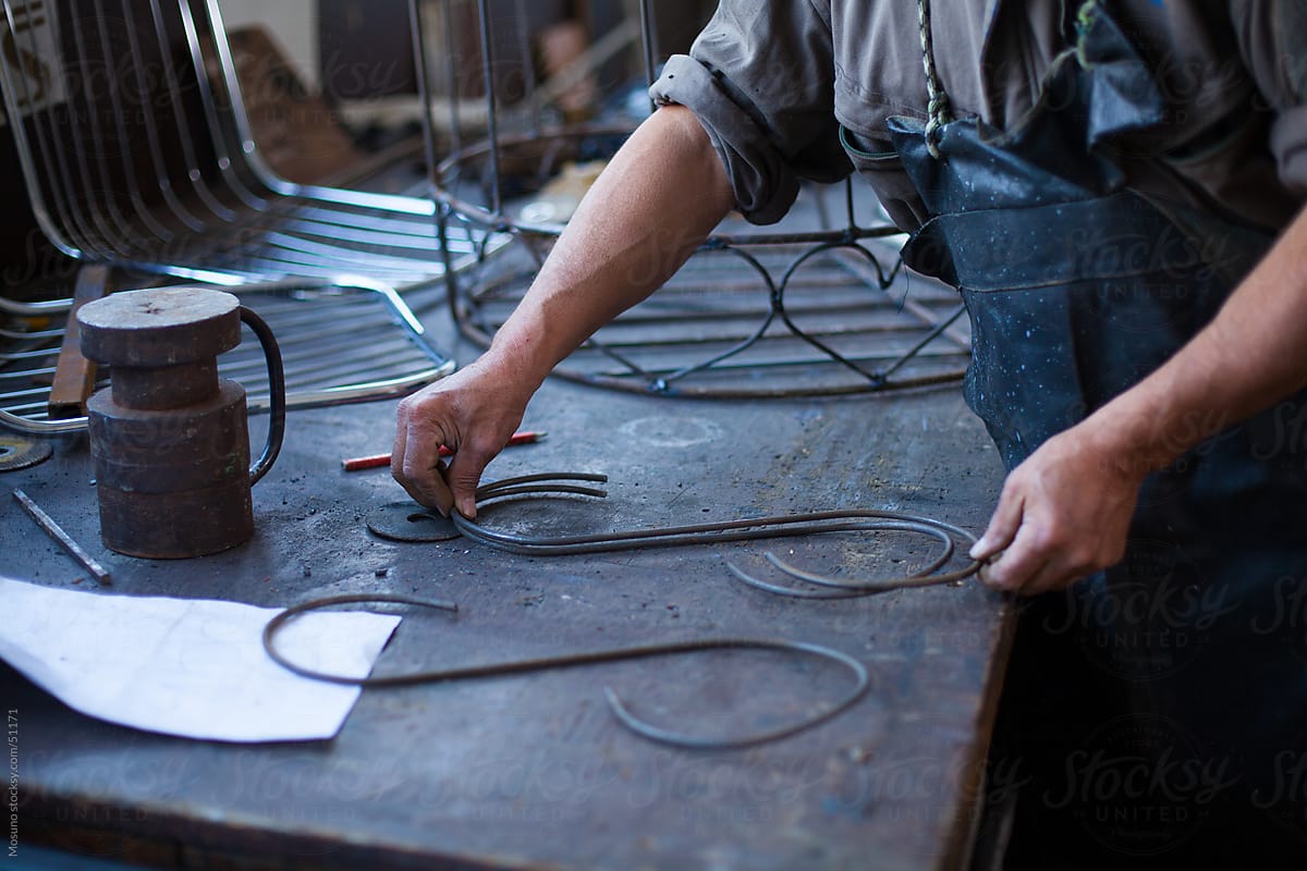 "Old Craftsman In His Workshop." by Stocksy Contributor "Mosuno" - Stocksy