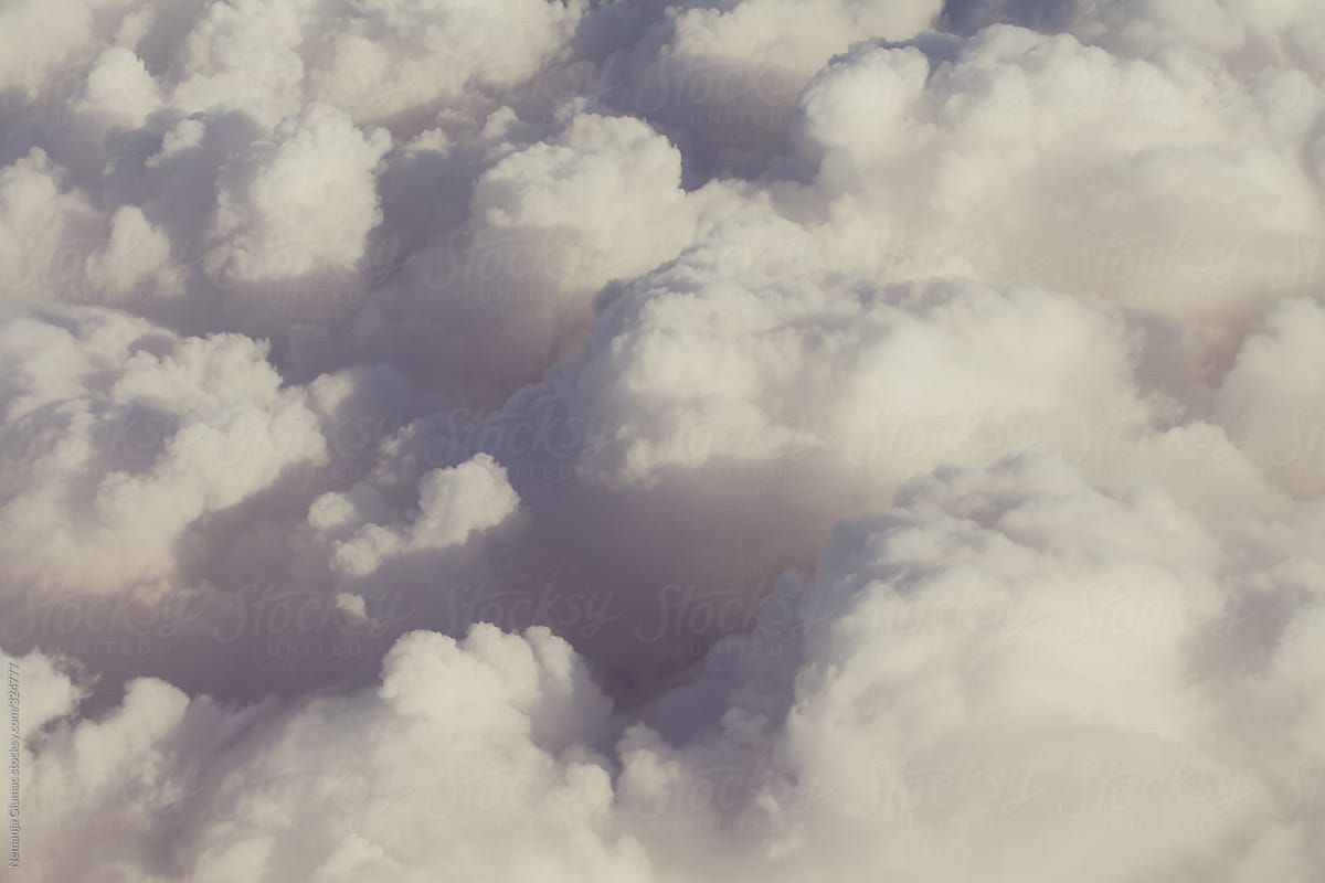 "Fluffy Clouds" by Stocksy Contributor "Nemanja Glumac" - Stocksy