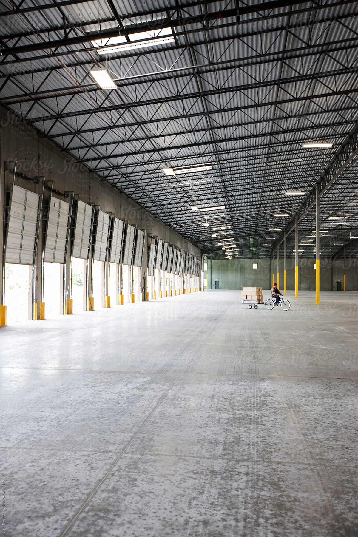 "Empty Warehouse" by Stocksy Contributor "Walter And Deb Hodges ...