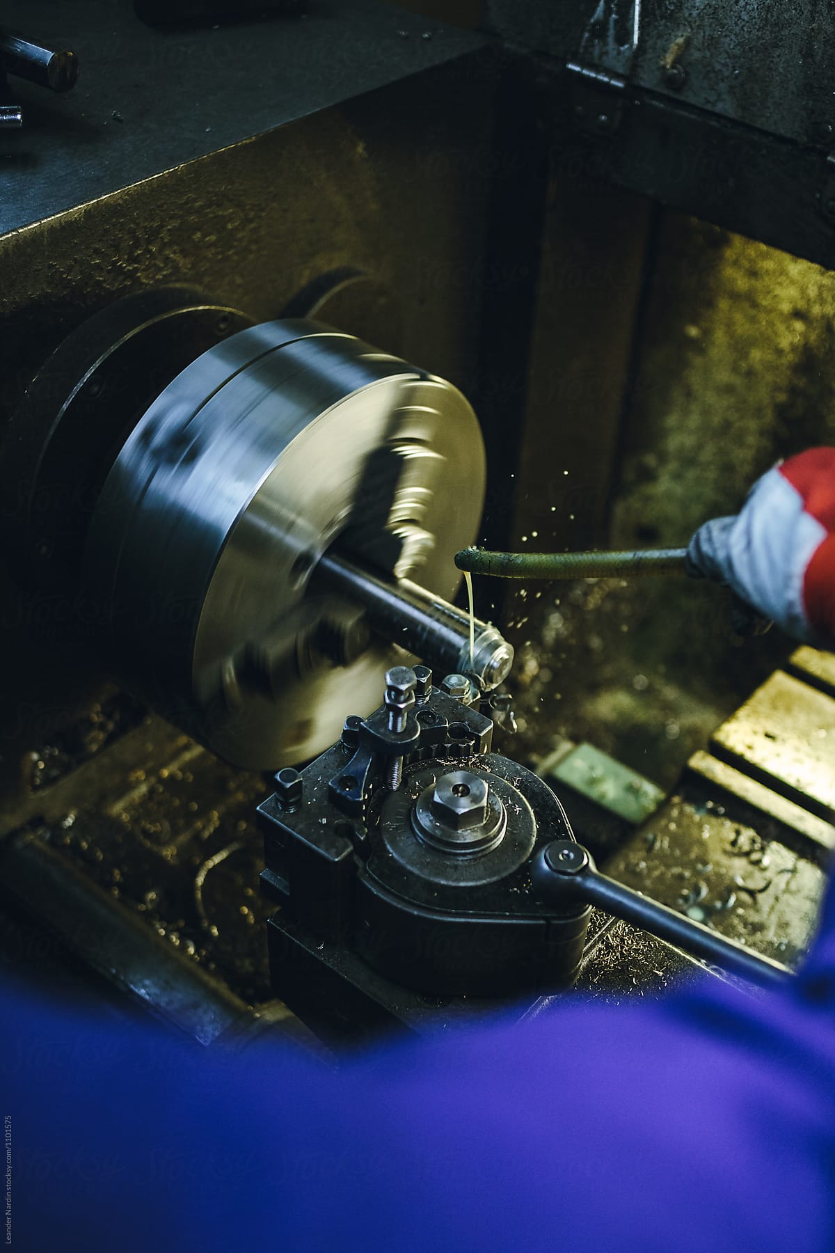 "Detail Of A Metal Worker Cooling An Engine Lathe" by Stocksy ...
