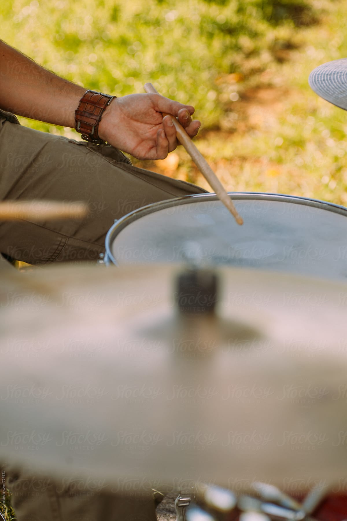 "Drummer Playing In Nature" by Stocksy Contributor "Giada Canu" - Stocksy