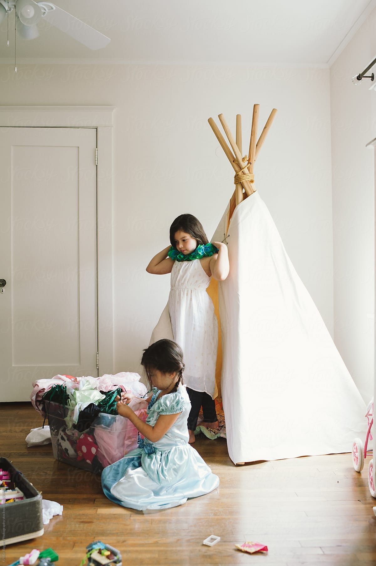 "Sisters Playing Dress Up Being Silly Near Teepee" by Stocksy ...
