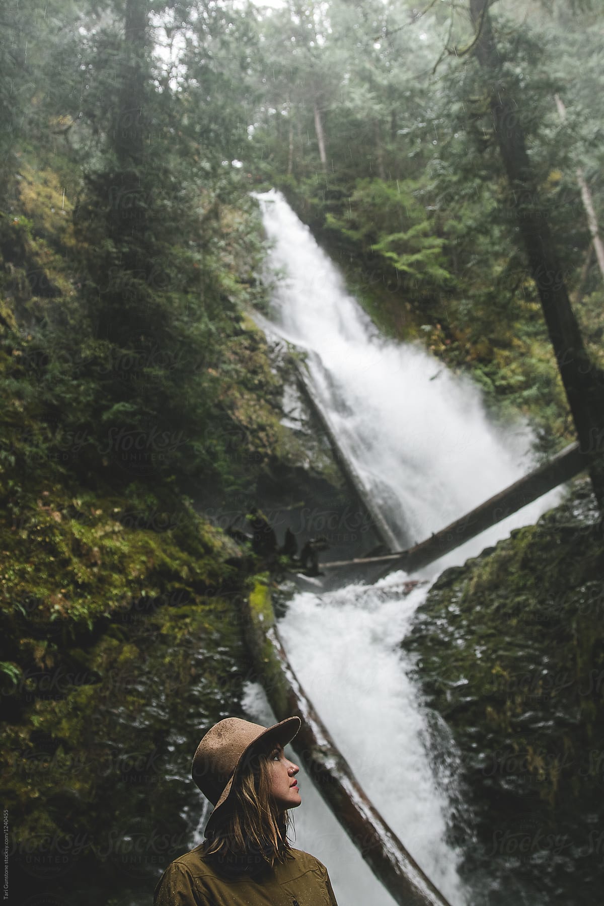 "Woman And Waterfall" by Stocksy Contributor "Tari Gunstone" - Stocksy