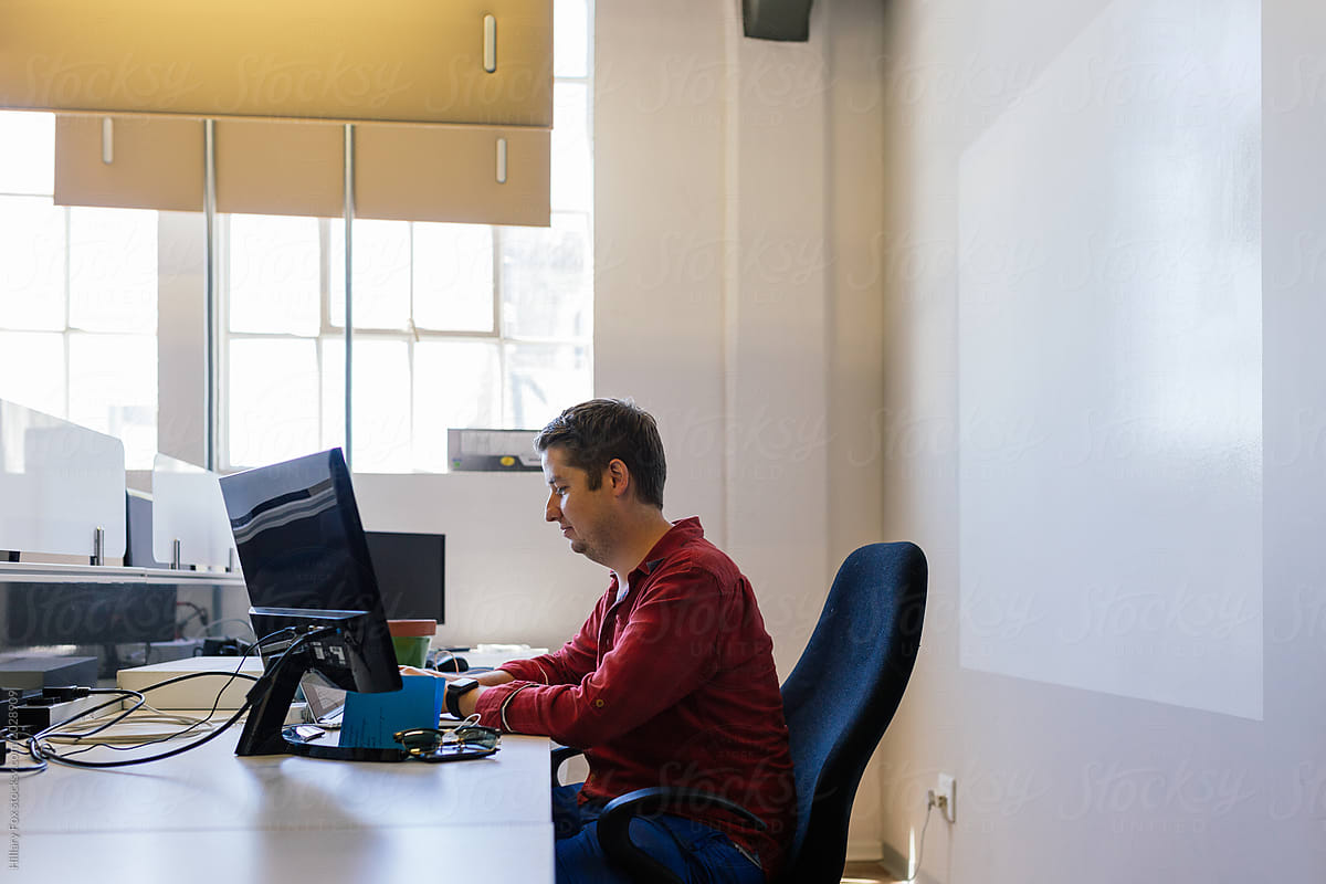 "Working In A Modern Office" by Stocksy Contributor "Hillary Fox" - Stocksy
