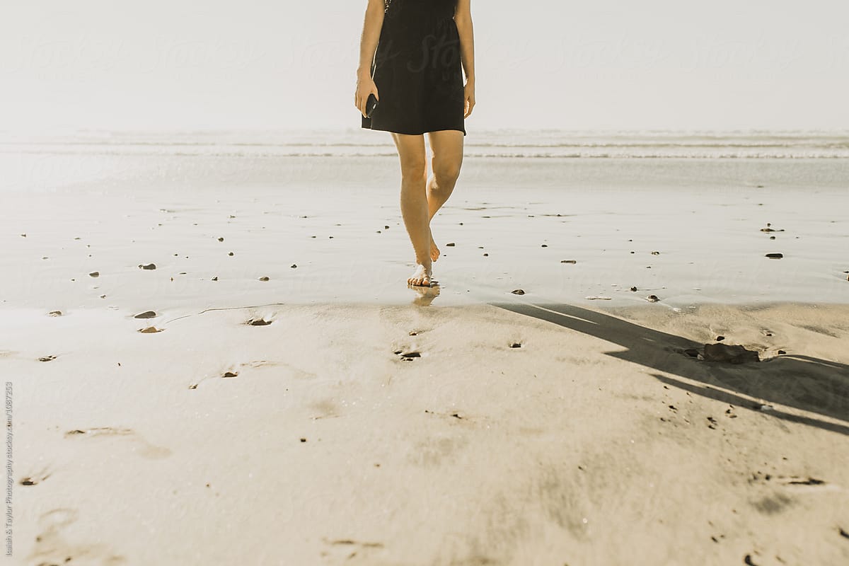 "Girl Walking On Beach" by Stocksy Contributor "Itla" - Stocksy