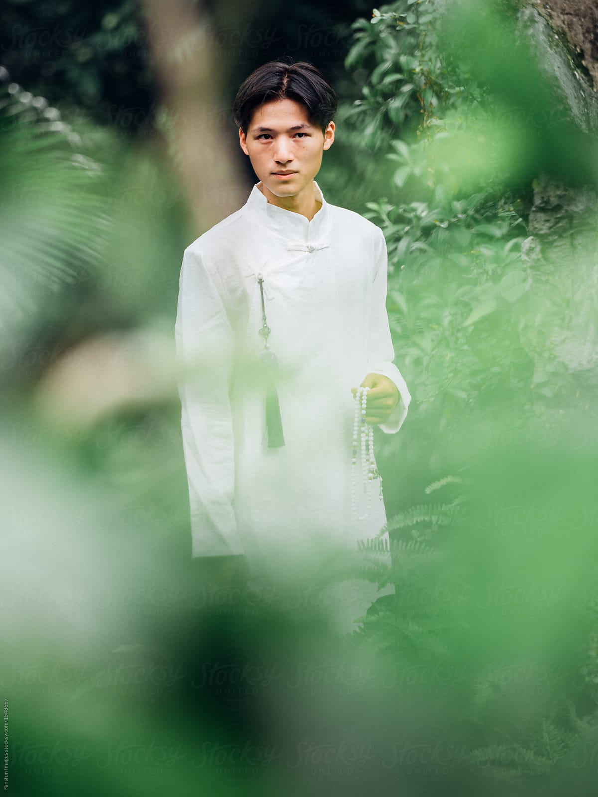 "Asian Man With Zen Buddha Gesture" by Stocksy Contributor "Pansfun ...