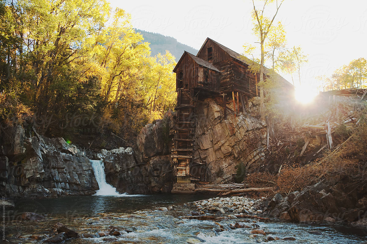"Old Mill With Waterfall" by Stocksy Contributor "Kevin Russ" - Stocksy
