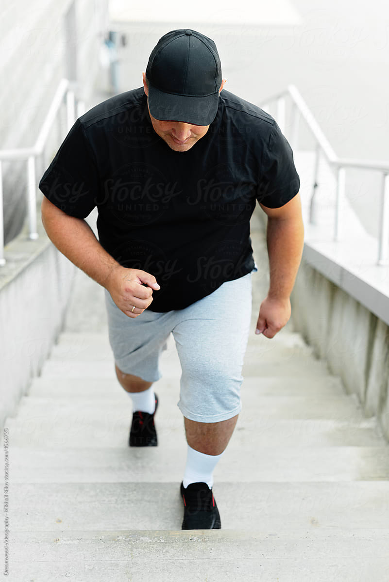 "White Man Climbing Stairs" by Stocksy Contributor "Dreamwood ...