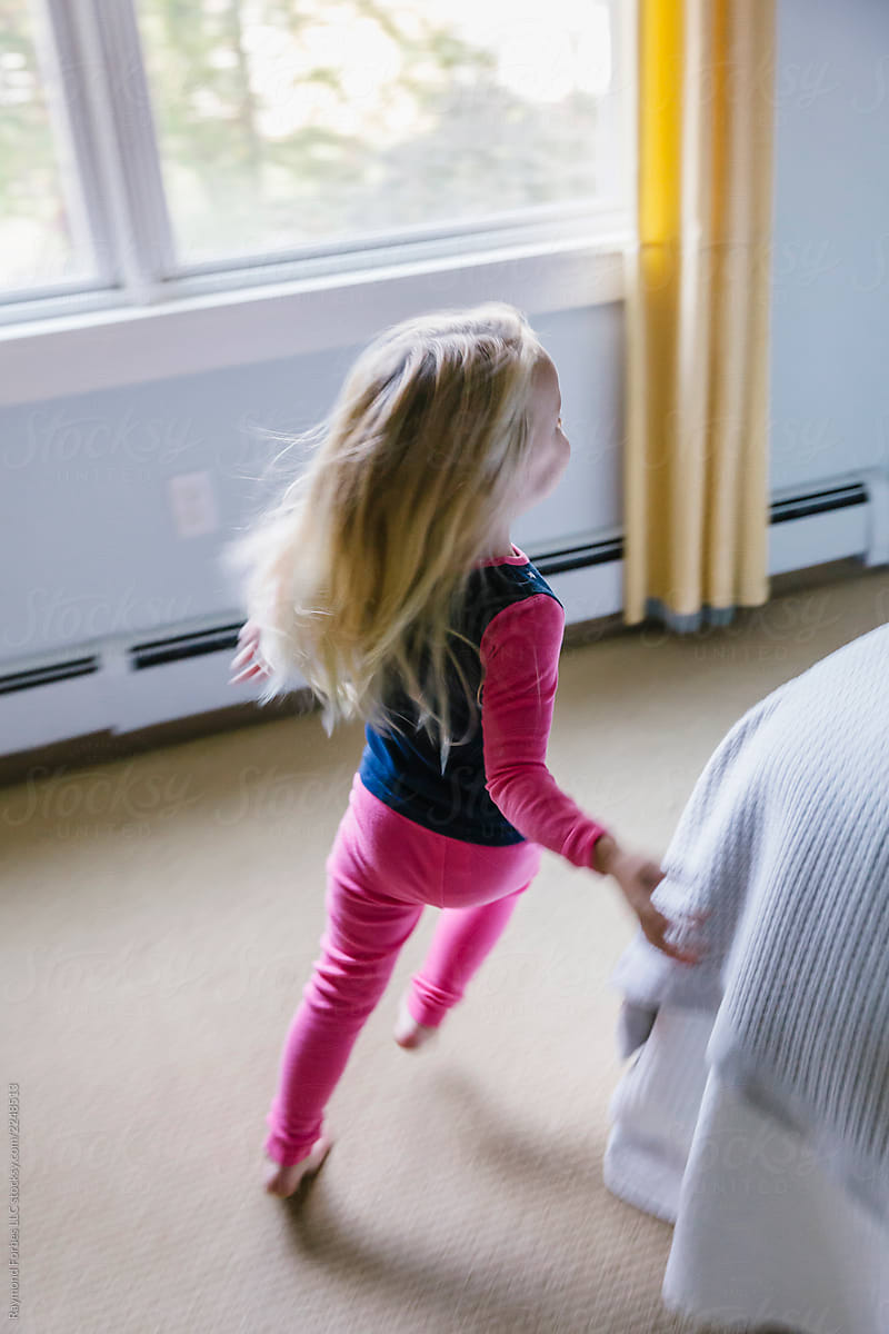 "Little Girl Escape" by Stocksy Contributor "Raymond Forbes LLC" - Stocksy