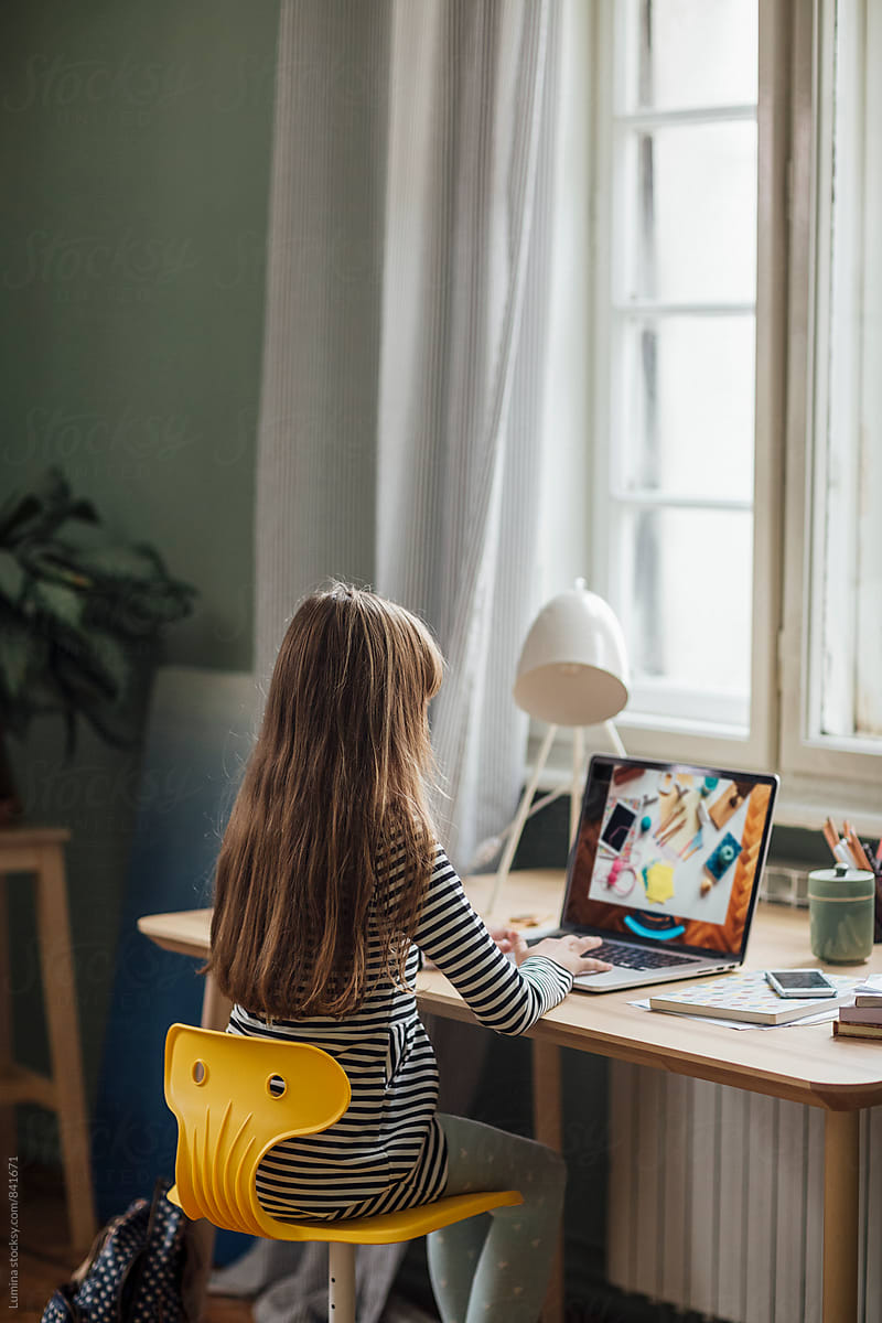 "Girl Doing Homework On Her Computer" by Stocksy Contributor "Lumina ...