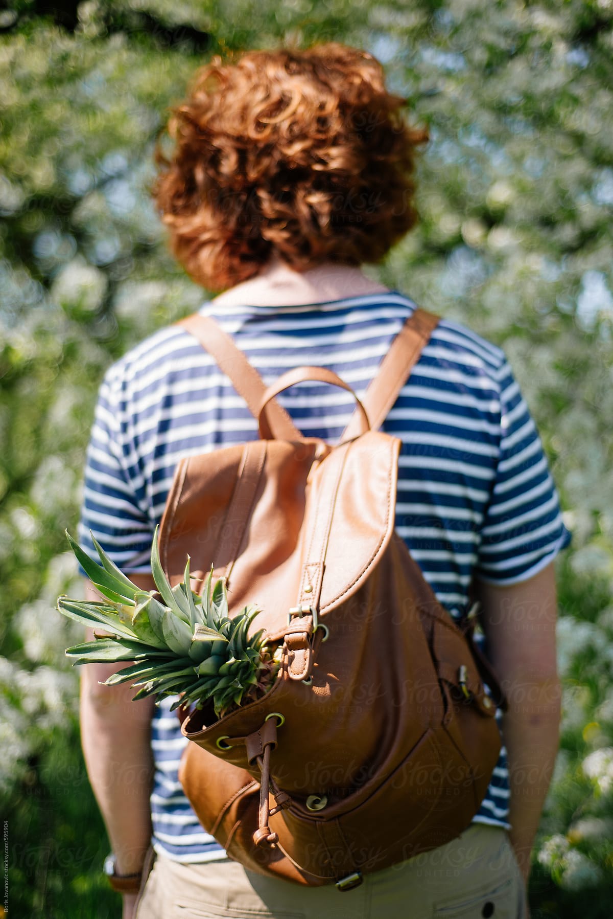 "Back Of Young Ginger Man With Pineapple In Backpack" by Stocksy ...