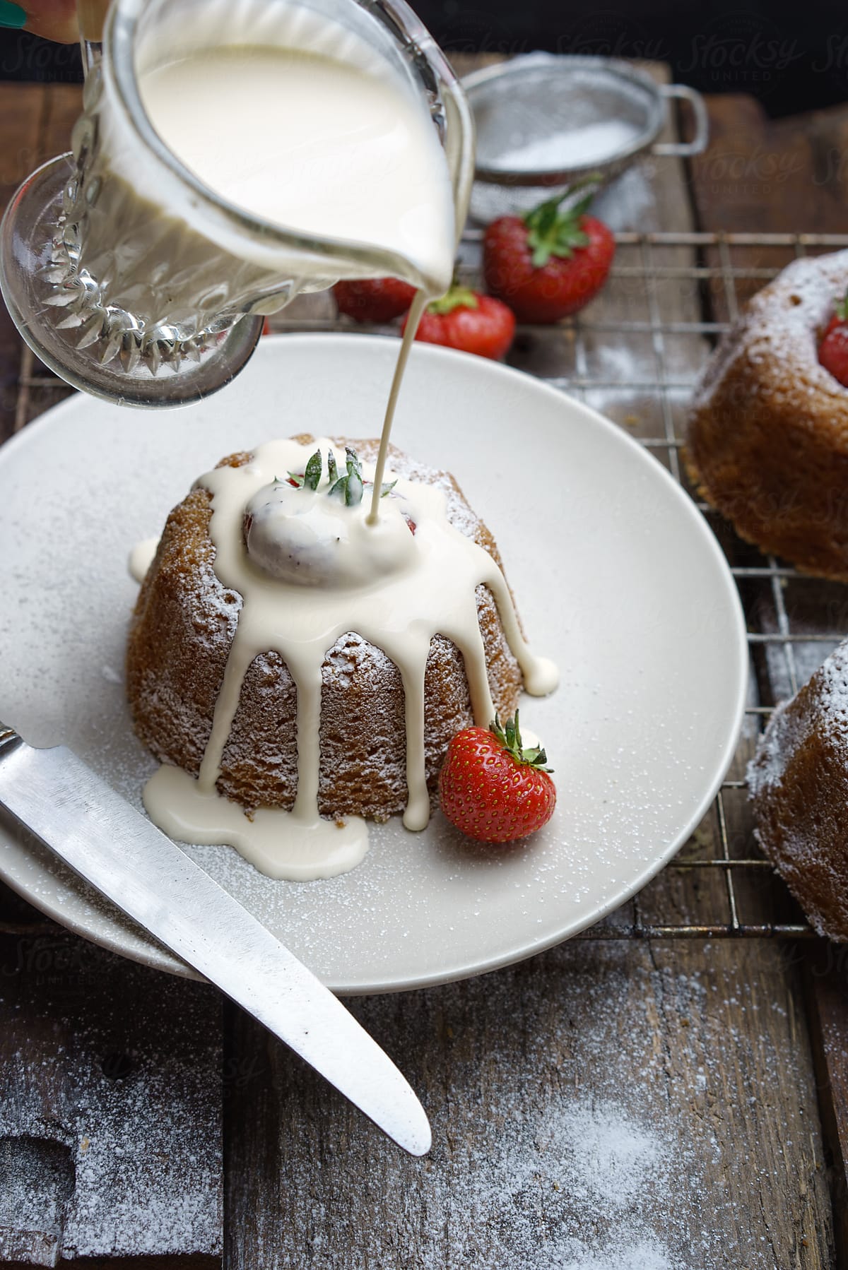 "Cream Being Poured Over A Sponge Cake." by Stocksy Contributor "Darren ...
