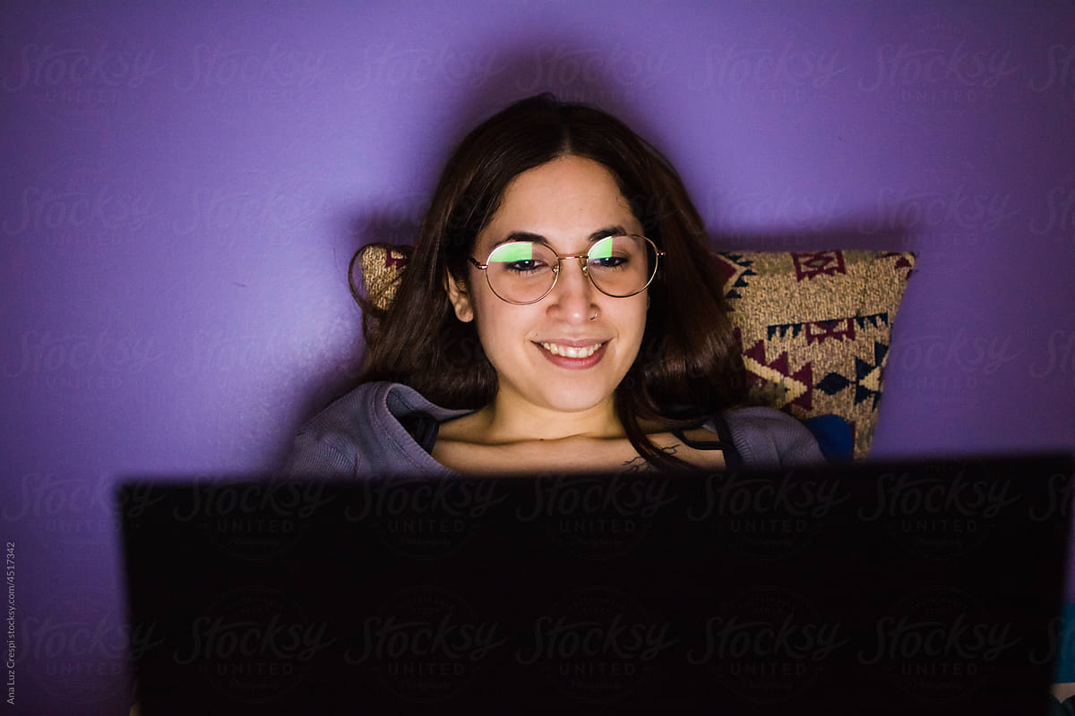 "Using Devices In Bed At Night" by Stocksy Contributor "Ana Luz Crespi ...