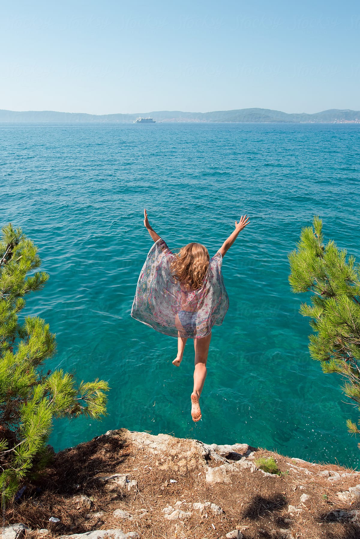 Young Woman Jumping Off Cliff In The Sea By Stocksy Contributor Ibex Young Woman Jumping Off Cliff In The Sea By Stocksy Contributor Ibex