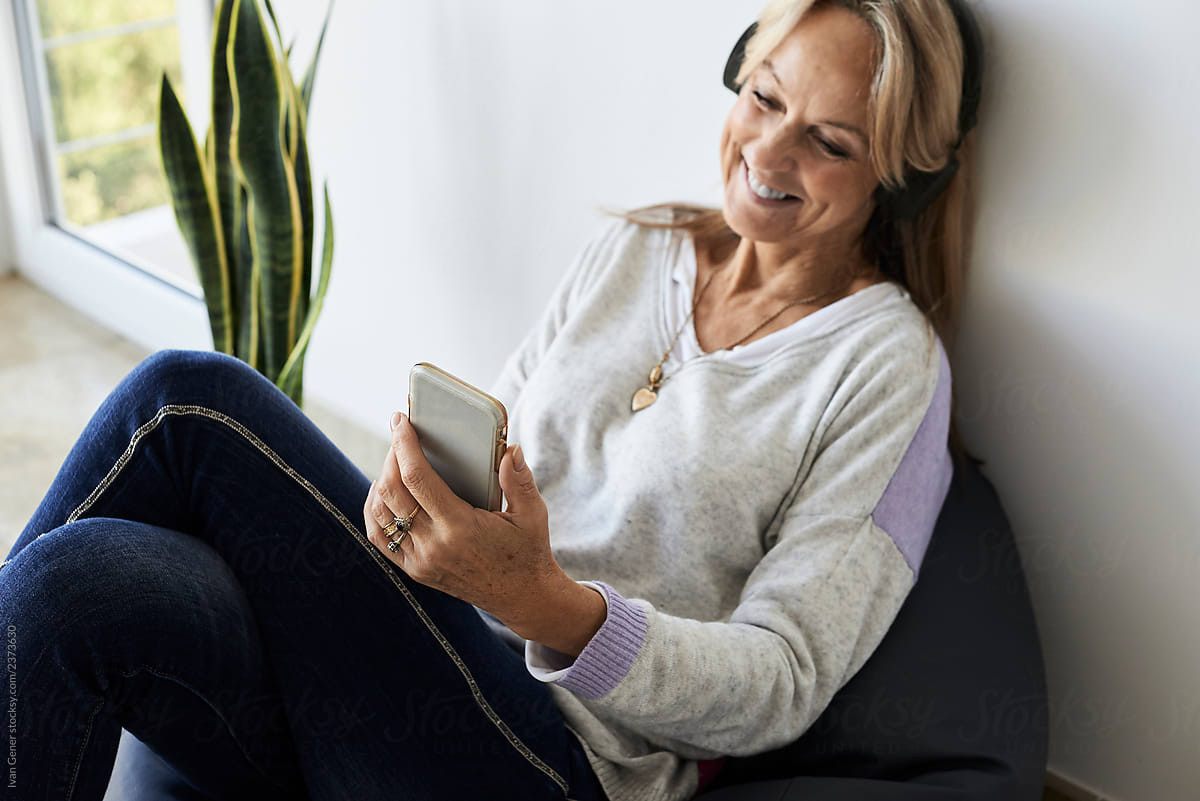"Senior Woman Using Technology At Home." by Stocksy Contributor "Ivan ...