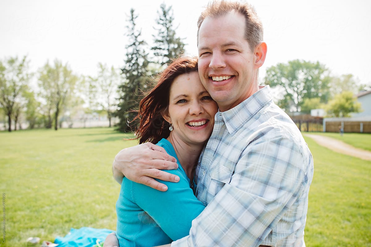 "Happy Husband And Wife Embracing" by Stocksy Contributor "Carey Shaw ...