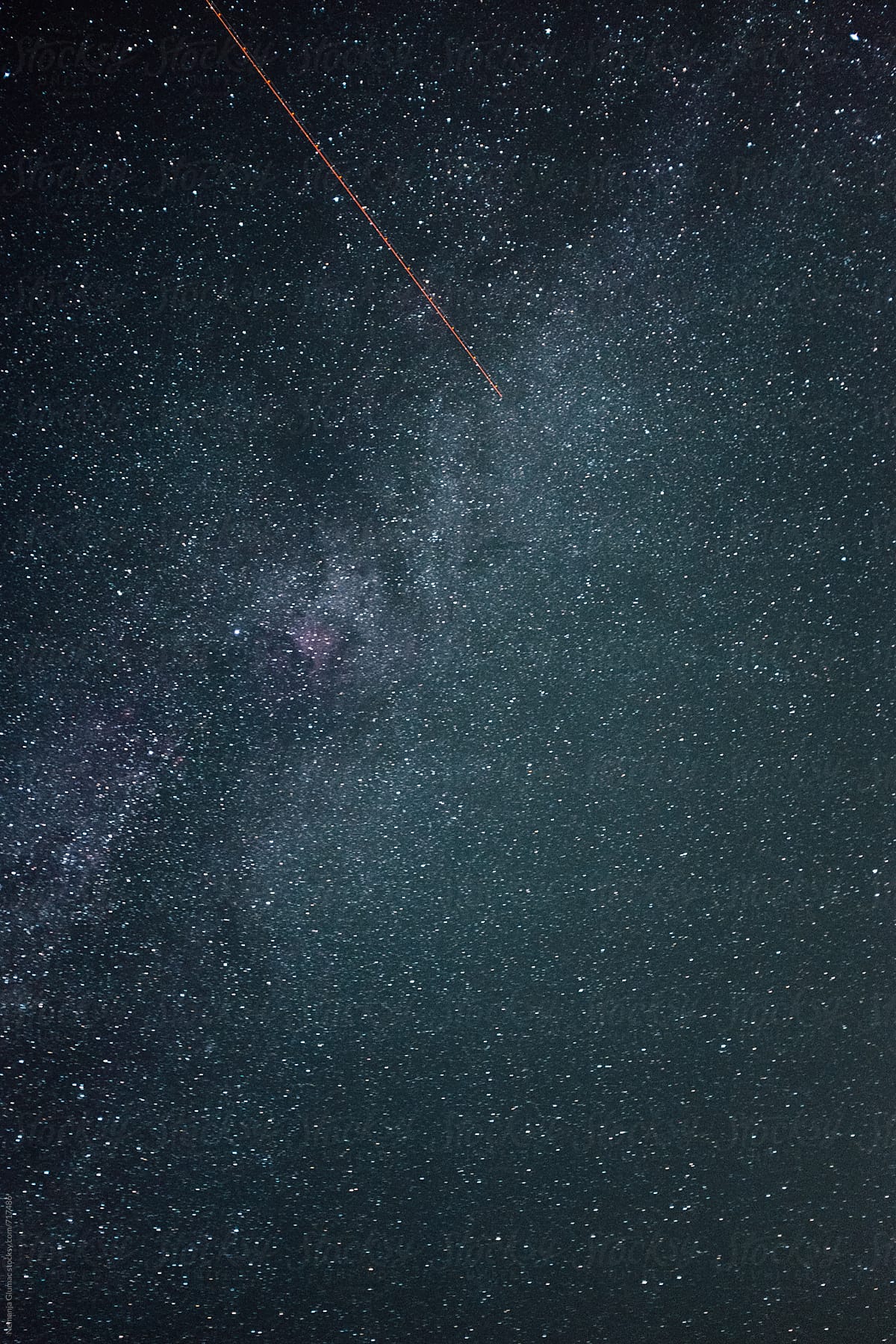 "Starry Sky With Airplane And Satellite Linear Trails" by Stocksy ...