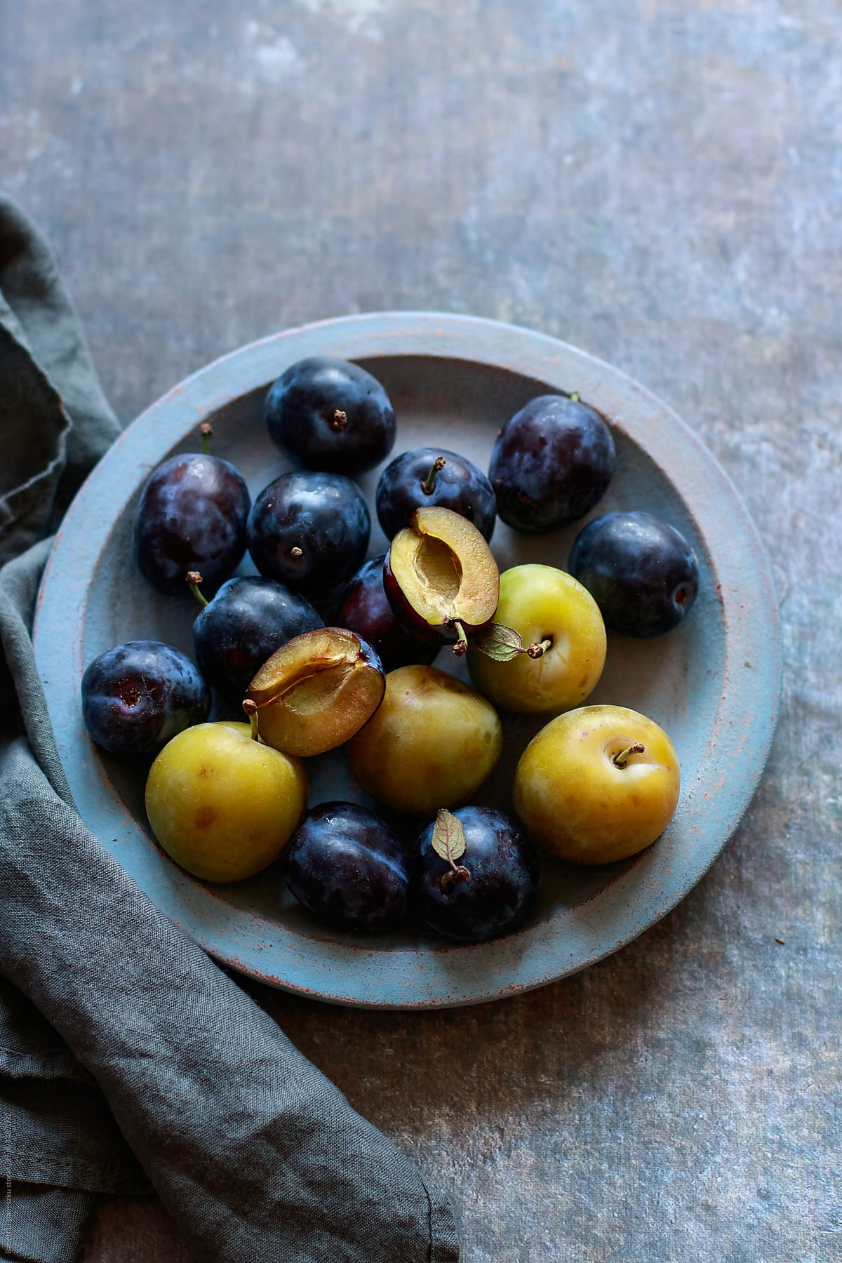 "Freshly Picked Plum" by Stocksy Contributor "Babett Lupaneszku" - Stocksy
