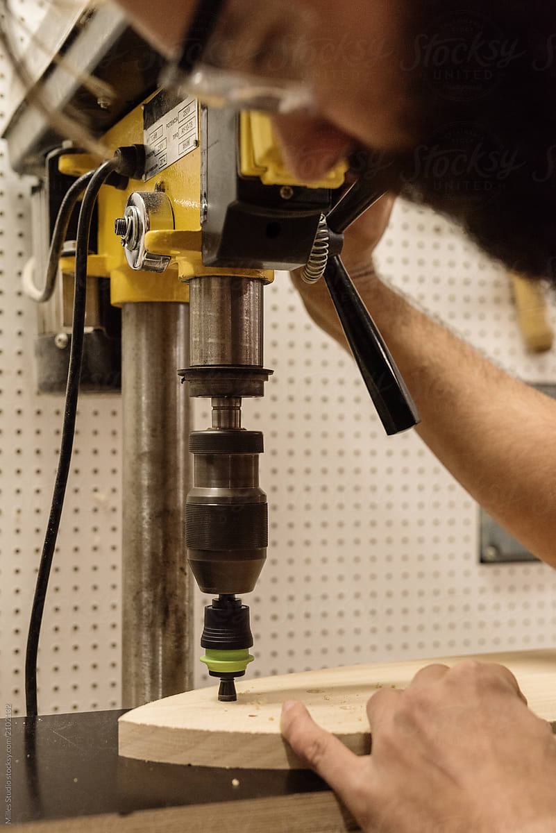"Craftsman Using Drilling Machine On Deck" by Stocksy Contributor ...