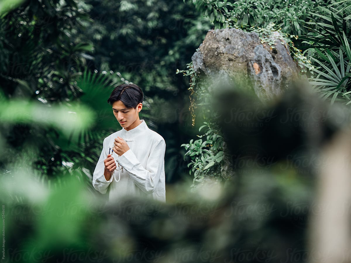 "Asian Man With Zen Buddha Gesture" by Stocksy Contributor "Pansfun ...