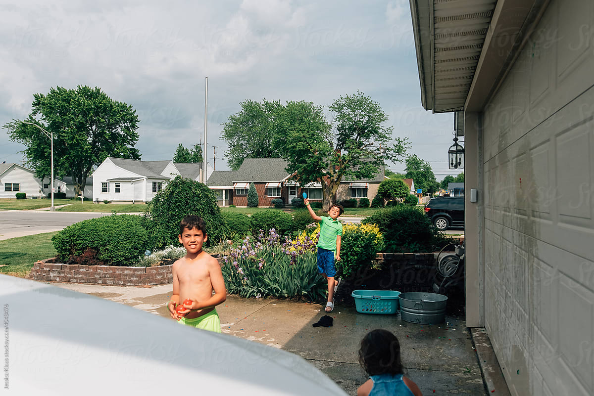 "Boy Throwing Water Balloon." by Stocksy Contributor "Jessica Klaus ...