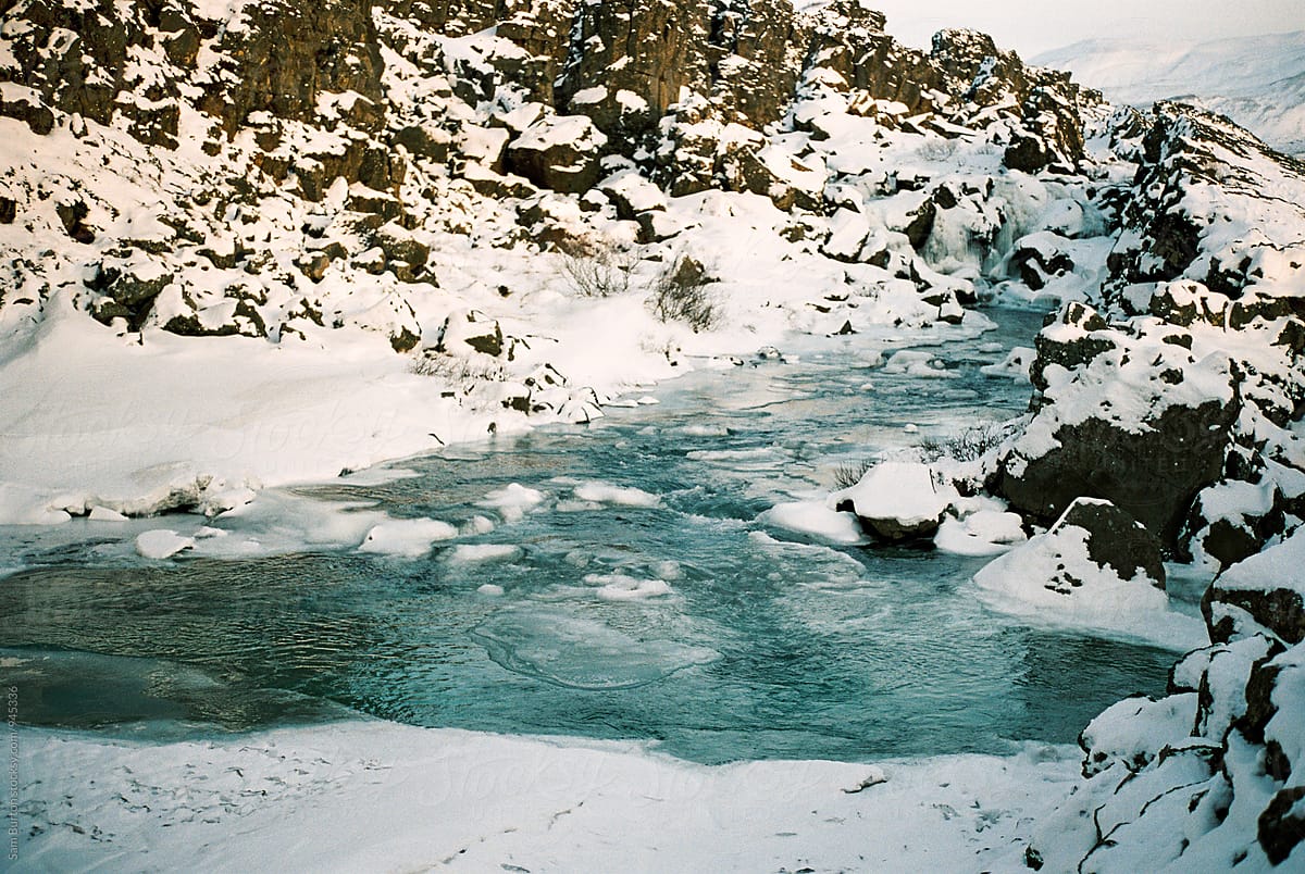 "Frozen Stream" by Stocksy Contributor "Sam Burton" - Stocksy