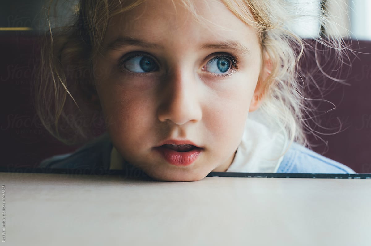Portrait Of Cute Four Year Old Girl Leaning Chin On Table By Stocksy Portrait Of Cute Four Year Old Girl Leaning Chin On Table By Stocksy