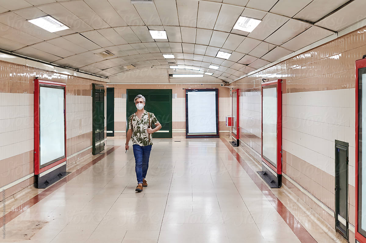 "Man Walking Alone In A Subway Station" by Stocksy Contributor "Ivan ...