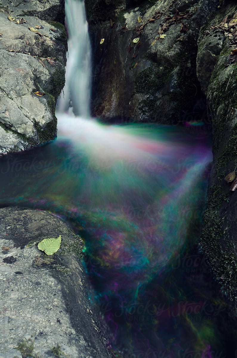 "Iridescent Waterfall" by Stocksy Contributor "Cosma Andrei" - Stocksy