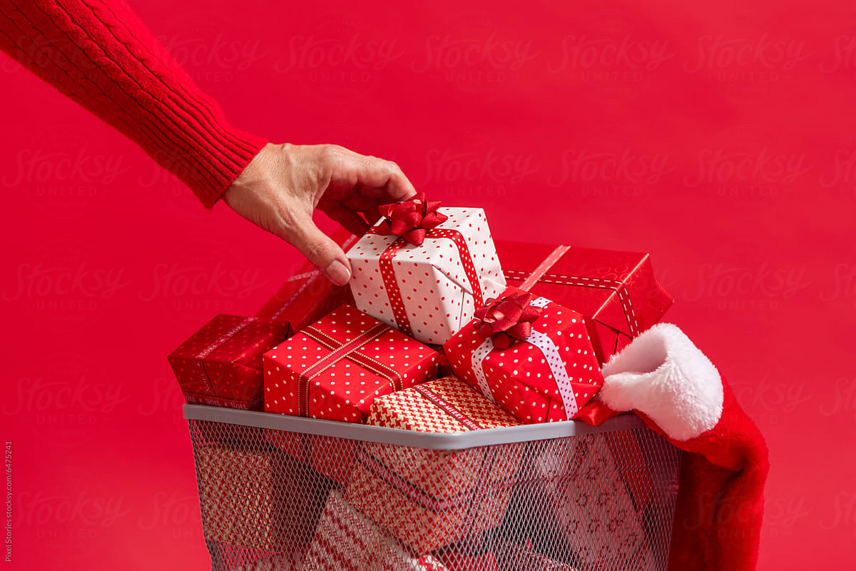 "Christmas Presents And Gifts In Trash Can. Over Consumption" by ...