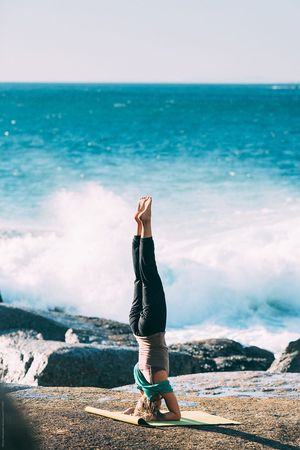 "Yoga By The Sea" by Stocksy Contributor "Juno" - Stocksy