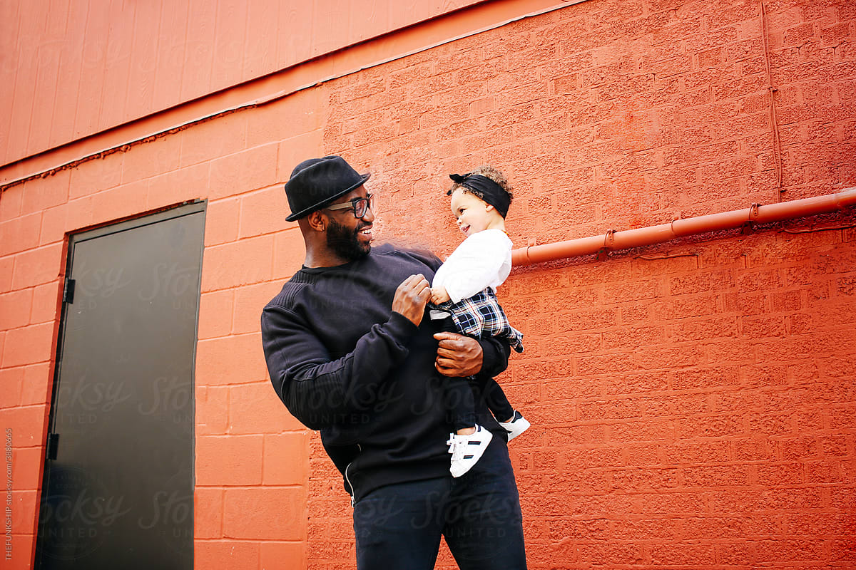 "Portrait Of A Black Father" by Stocksy Contributor "THEFUNKSHIP" - Stocksy