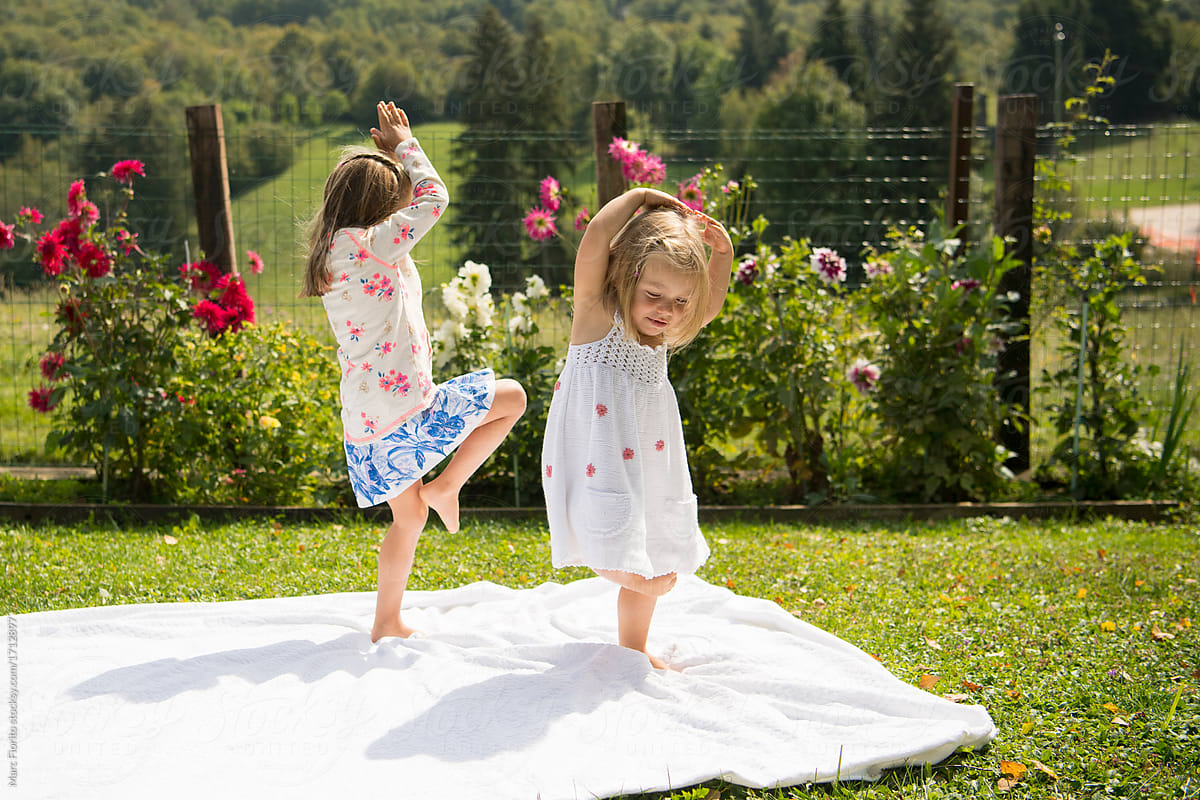 "Kids' Yoga" by Stocksy Contributor "Marc Fiorito" - Stocksy